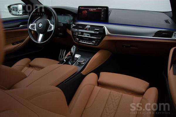 Blue BMW 520 2022 in Riga, with an engine capacity of 2.00 L and mileage of 94 thousand km for 33000 €, photo 4 on AUTOMOTO.COM.LV