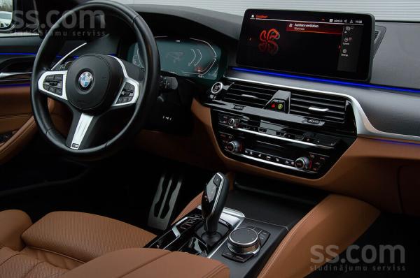 Blue BMW 520 2022 in Riga, with an engine capacity of 2.00 L and mileage of 94 thousand km for 33000 €, photo 5 on AUTOMOTO.COM.LV