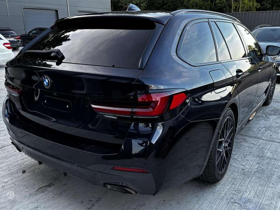 Blue BMW 520 2022 in Utena, with an engine capacity of 2.00 L and mileage of 300 thousand km for 15500 €, photo 4 on AUTOMOTO.COM.LV