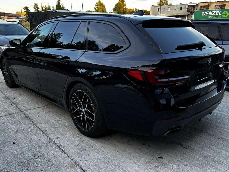 Blue BMW 520 2022 in Utena, with an engine capacity of 2.00 L and mileage of 300 thousand km for 15500 €, photo 5 on AUTOMOTO.COM.LV