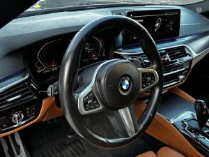 Blue BMW 520 2022 in Utena, with an engine capacity of 2.00 L and mileage of 300 thousand km for 15500 €, photo 11 on AUTOMOTO.COM.LV