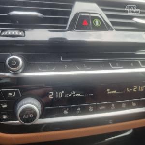 Brown BMW 520 2018 in Vilnius, with an engine capacity of 2.00 L and mileage of 225 thousand km for 16200 €, photo 21 on AUTOMOTO.COM.LV