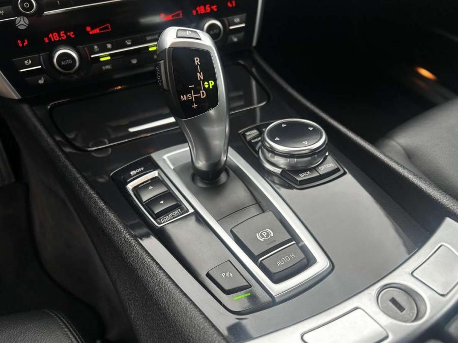 Brown BMW 520 2014 in Utena, with an engine capacity of 2.00 L and mileage of 251 thousand km for 11999 €, photo 18 on AUTOMOTO.COM.LV