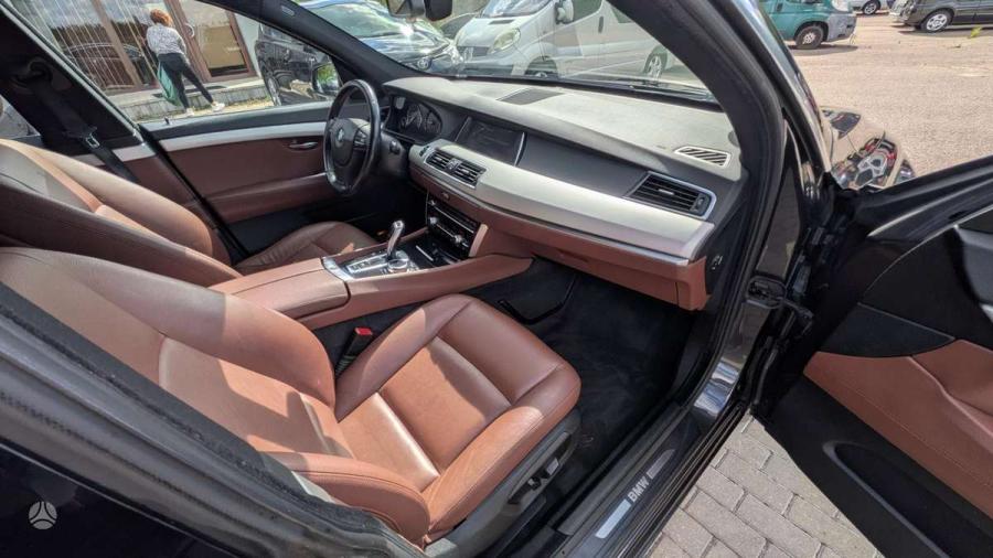 Brown BMW 520 2014 in Utena, with an engine capacity of 2.00 L and mileage of 290 thousand km for 9850 €, photo 28 on AUTOMOTO.COM.LV