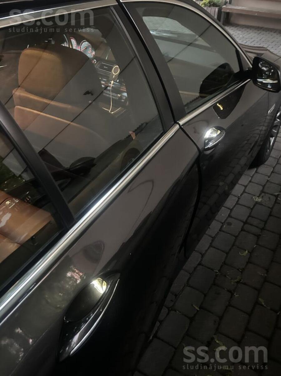 Brown BMW 520 2016 in Riga, with an engine capacity of 2.00 L and mileage of 286 thousand km for 10555 €, photo 21 on AUTOMOTO.COM.LV