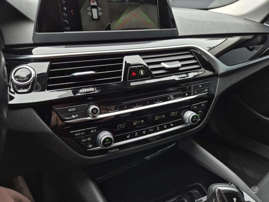 Brown BMW 520 2017 in Utena, with an engine capacity of 2.00 L and mileage of 331 thousand km for 13990 €, photo 19 on AUTOMOTO.COM.LV