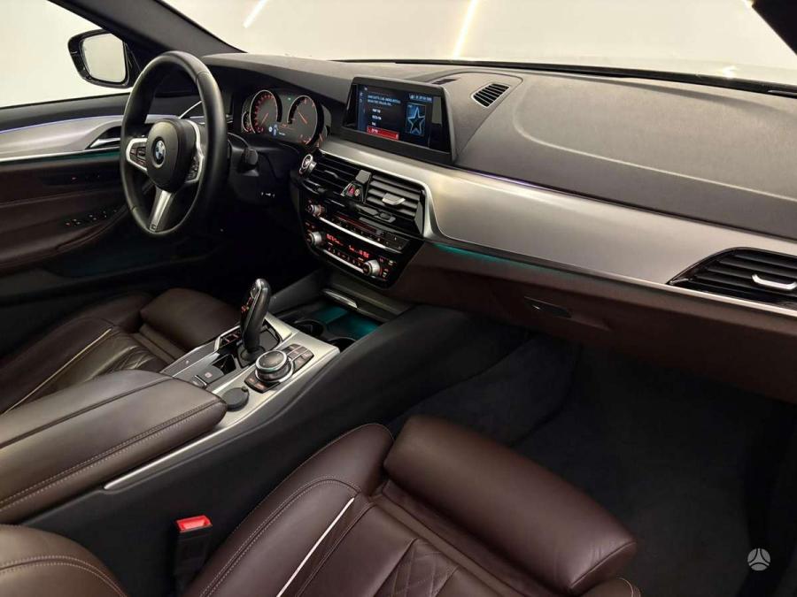 Brown BMW 520 2018 in Marijampole, with an engine capacity of 2.00 L and mileage of 187 thousand km for 17999 €, photo 17 on AUTOMOTO.COM.LV