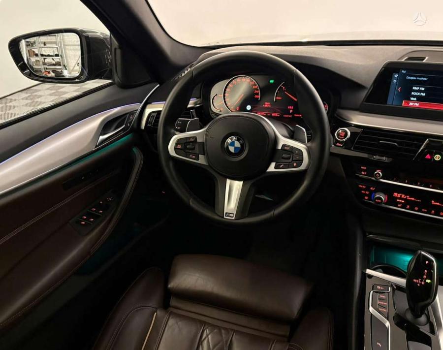 Brown BMW 520 2018 in Marijampole, with an engine capacity of 2.00 L and mileage of 187 thousand km for 17999 €, photo 23 on AUTOMOTO.COM.LV