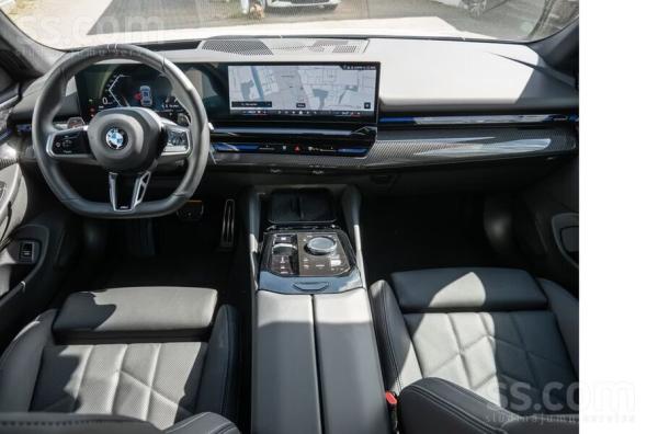 Grey BMW 520 2024 in Riga, with an engine capacity of 2.00 L and mileage of 38 thousand km for 48500 €, photo 4 on AUTOMOTO.COM.LV