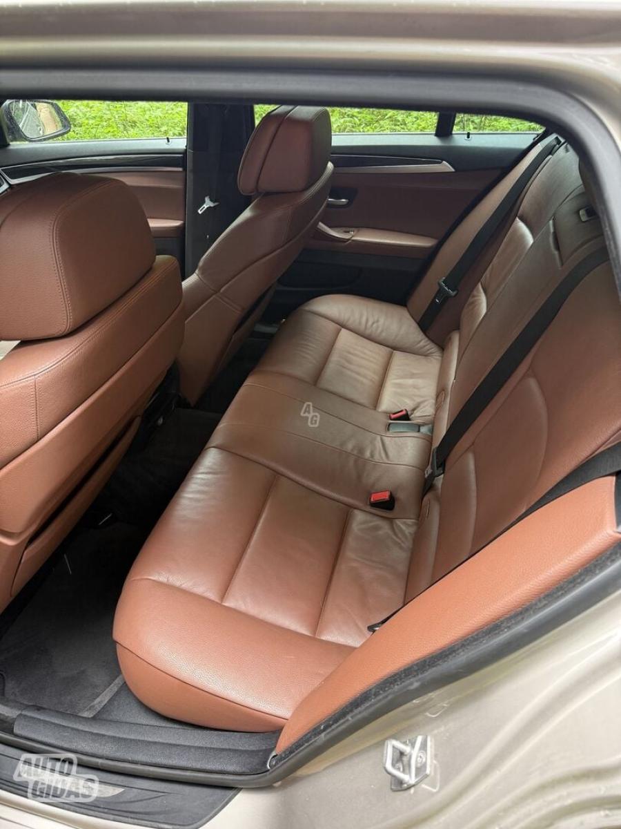 Grey BMW 520 2012 in Kaunas, with an engine capacity of 2.00 L and mileage of 366 thousand km for 8699 €, photo 20 on AUTOMOTO.COM.LV