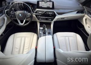 Grey BMW 520 2017 in Riga, with an engine capacity of 2.00 L and mileage of 260 thousand km for 18000 €, photo 15 on AUTOMOTO.COM.LV
