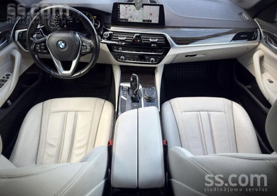 Grey BMW 520 2017 in Riga, with an engine capacity of 2.00 L and mileage of 260 thousand km for 18000 €, photo 15 on AUTOMOTO.COM.LV