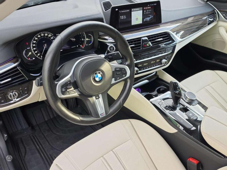 Grey BMW 520 2017 in Jonava, with an engine capacity of 2.00 L and mileage of 240 thousand km for 17700 €, photo 31 on AUTOMOTO.COM.LV