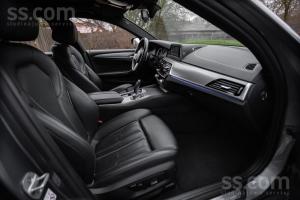 Grey BMW 520 2017 in Riga, with an engine capacity of 2.00 L and mileage of 180 thousand km for 19900 €, photo 7 on AUTOMOTO.COM.LV