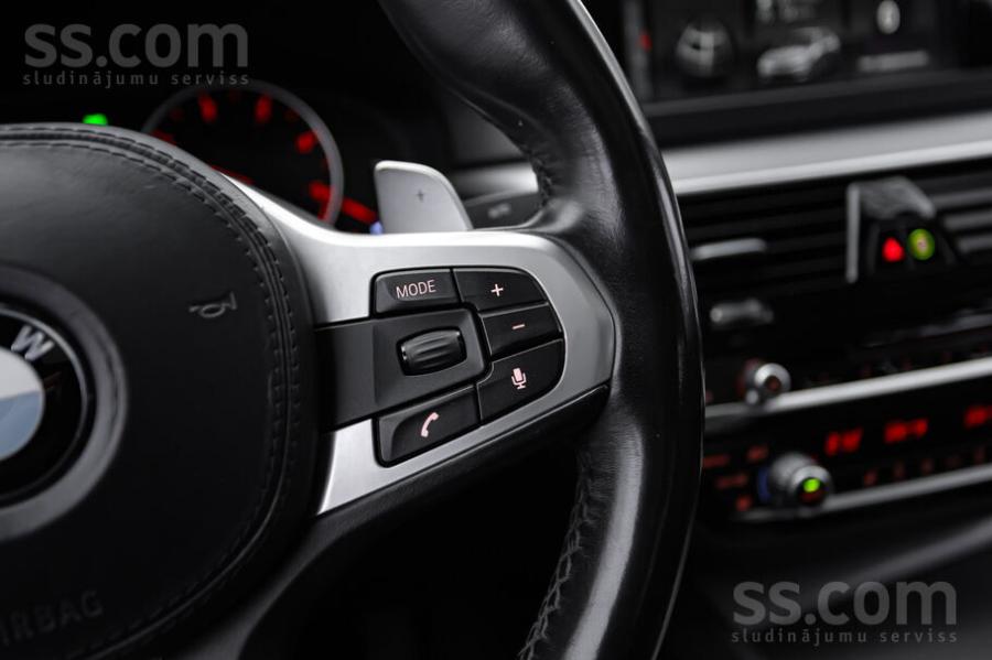 Grey BMW 520 2017 in Riga, with an engine capacity of 2.00 L and mileage of 180 thousand km for 19900 €, photo 22 on AUTOMOTO.COM.LV