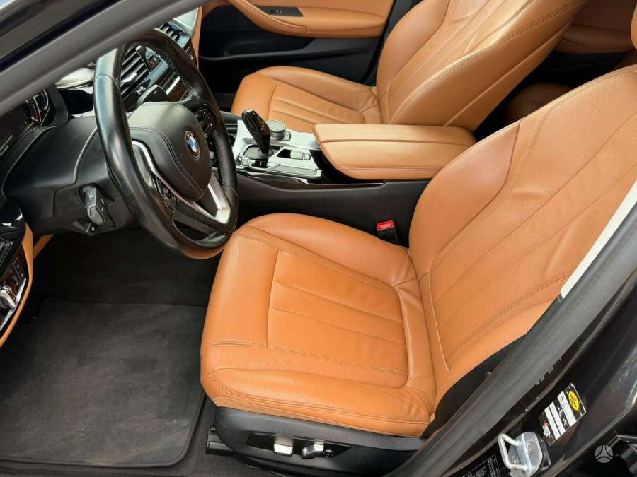 Grey BMW 520 2018 in Utena, with an engine capacity of 2.00 L and mileage of 239 thousand km for 15200 €, photo 13 on AUTOMOTO.COM.LV