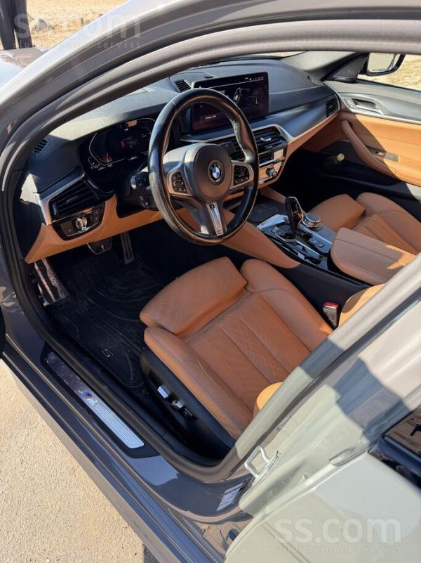 Grey BMW 520 2021 in Riga, with an engine capacity of 2.00 L and mileage of 72 thousand km for 34999 €, photo 4 on AUTOMOTO.COM.LV