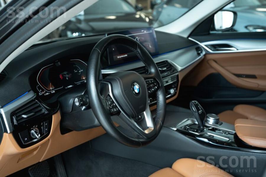 Grey BMW 520 2021 in Riga, with an engine capacity of 2.00 L and mileage of 145 thousand km for 28900 €, photo 4 on AUTOMOTO.COM.LV