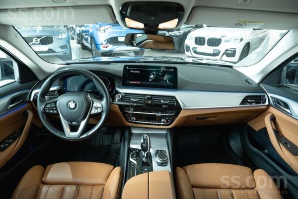 Grey BMW 520 2021 in Riga, with an engine capacity of 2.00 L and mileage of 145 thousand km for 28900 €, photo 5 on AUTOMOTO.COM.LV