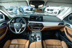 Grey BMW 520 2021 in Riga, with an engine capacity of 2.00 L and mileage of 145 thousand km for 28900 €, photo 5 on AUTOMOTO.COM.LV