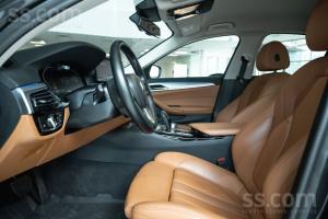 Grey BMW 520 2021 in Riga, with an engine capacity of 2.00 L and mileage of 145 thousand km for 28900 €, photo 6 on AUTOMOTO.COM.LV