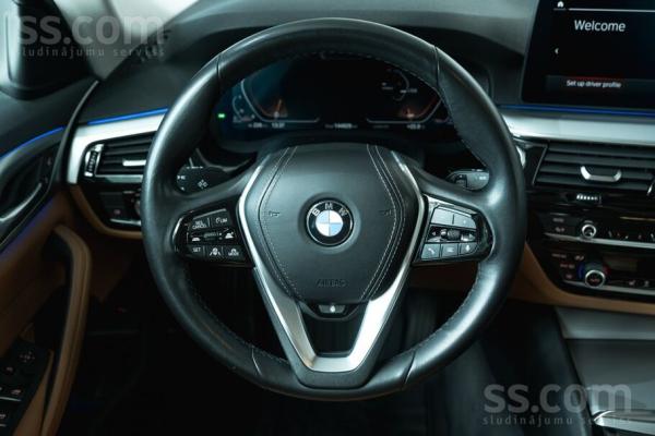 Grey BMW 520 2021 in Riga, with an engine capacity of 2.00 L and mileage of 145 thousand km for 28900 €, photo 10 on AUTOMOTO.COM.LV