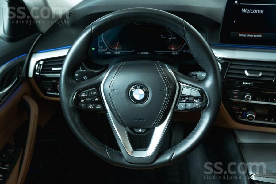 Grey BMW 520 2021 in Riga, with an engine capacity of 2.00 L and mileage of 145 thousand km for 28900 €, photo 10 on AUTOMOTO.COM.LV
