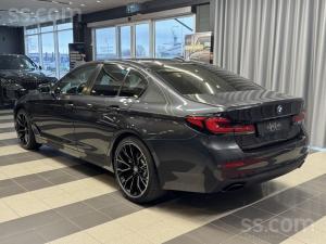 Grey BMW 520 2022 in Riga, with an engine capacity of 2.00 L and mileage of 212 thousand km for 23990 €, photo 7 on AUTOMOTO.COM.LV