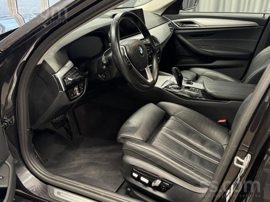 Grey BMW 520 2022 in Riga, with an engine capacity of 2.00 L and mileage of 212 thousand km for 23990 €, photo 9 on AUTOMOTO.COM.LV