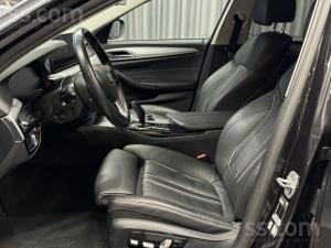 Grey BMW 520 2022 in Riga, with an engine capacity of 2.00 L and mileage of 212 thousand km for 23990 €, photo 10 on AUTOMOTO.COM.LV