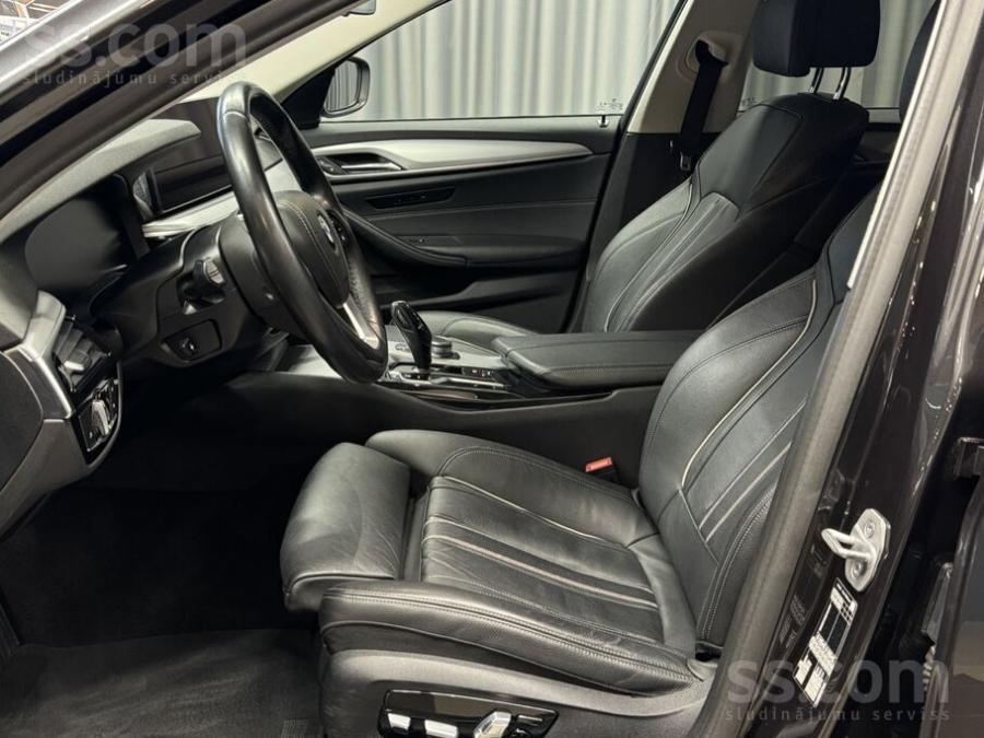 Grey BMW 520 2022 in Riga, with an engine capacity of 2.00 L and mileage of 212 thousand km for 23990 €, photo 10 on AUTOMOTO.COM.LV