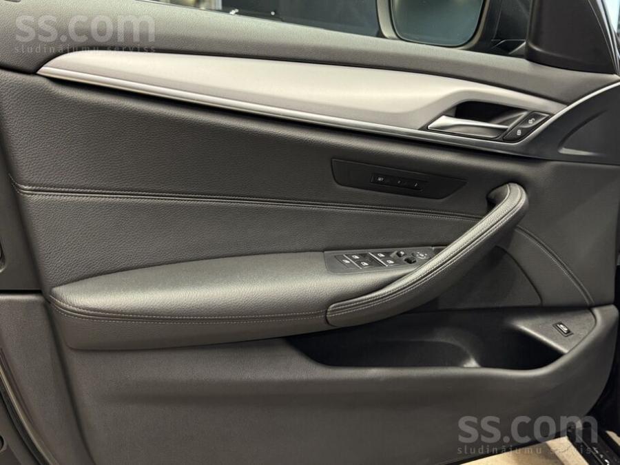Grey BMW 520 2022 in Riga, with an engine capacity of 2.00 L and mileage of 212 thousand km for 23990 €, photo 11 on AUTOMOTO.COM.LV