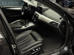 Grey BMW 520 2022 in Riga, with an engine capacity of 2.00 L and mileage of 212 thousand km for 23990 €, photo 13 on AUTOMOTO.COM.LV