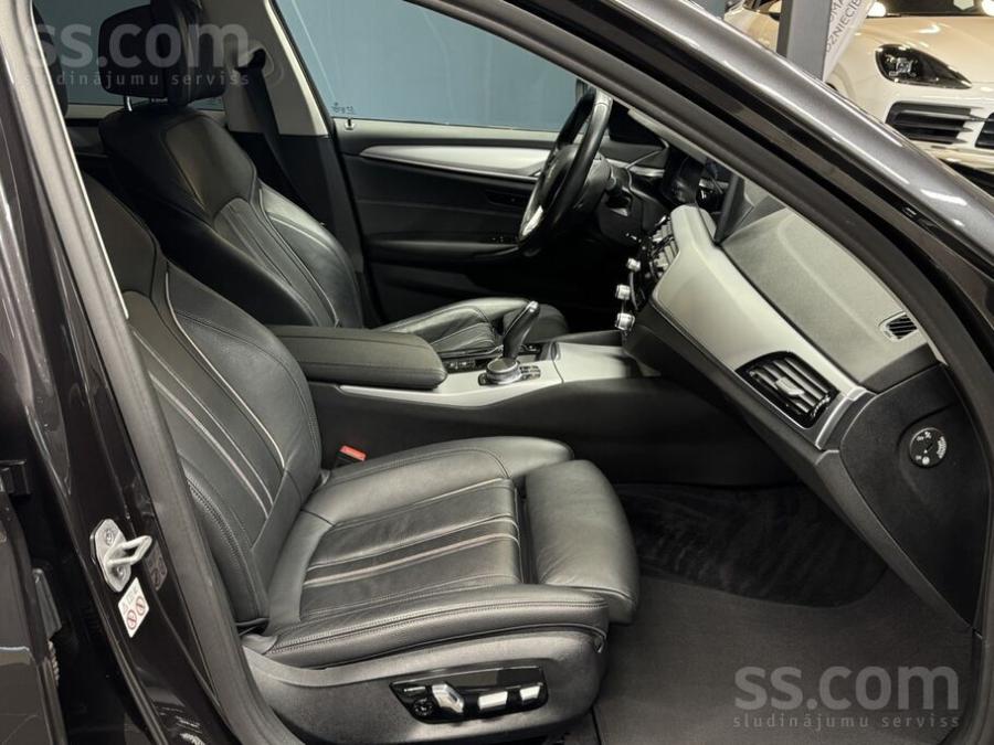 Grey BMW 520 2022 in Riga, with an engine capacity of 2.00 L and mileage of 212 thousand km for 23990 €, photo 14 on AUTOMOTO.COM.LV