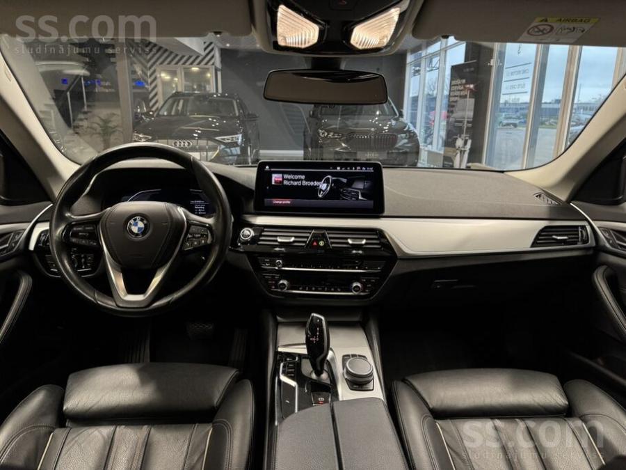 Grey BMW 520 2022 in Riga, with an engine capacity of 2.00 L and mileage of 212 thousand km for 23990 €, photo 15 on AUTOMOTO.COM.LV