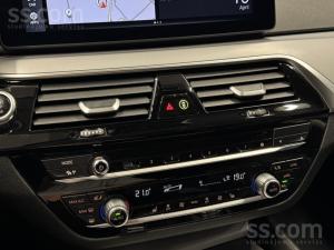 Grey BMW 520 2022 in Riga, with an engine capacity of 2.00 L and mileage of 212 thousand km for 23990 €, photo 23 on AUTOMOTO.COM.LV