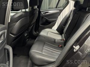 Grey BMW 520 2022 in Riga, with an engine capacity of 2.00 L and mileage of 212 thousand km for 23990 €, photo 26 on AUTOMOTO.COM.LV