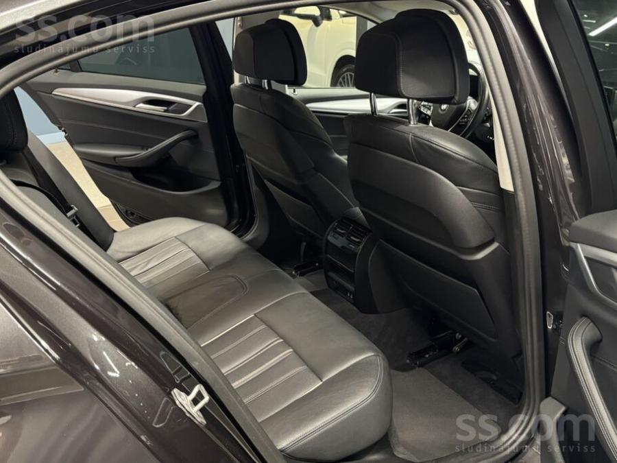 Grey BMW 520 2022 in Riga, with an engine capacity of 2.00 L and mileage of 212 thousand km for 23990 €, photo 27 on AUTOMOTO.COM.LV