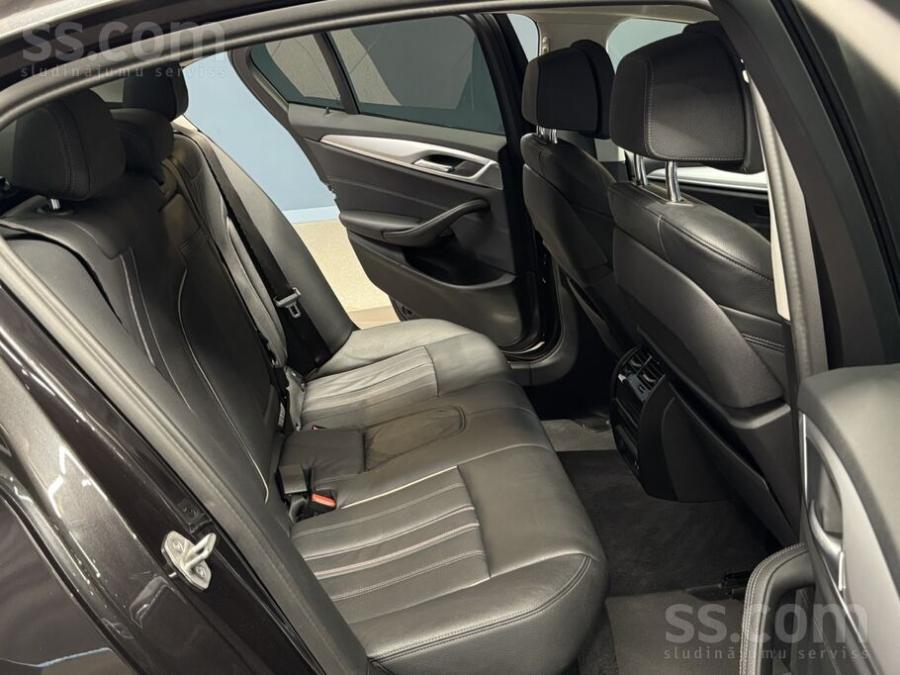 Grey BMW 520 2022 in Riga, with an engine capacity of 2.00 L and mileage of 212 thousand km for 23990 €, photo 28 on AUTOMOTO.COM.LV