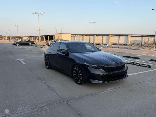 Grey BMW 520 2024 in Kaunas, with an engine capacity of 2.00 L and mileage of 69 thousand km for 47000 €, photo 1 on AUTOMOTO.COM.LV