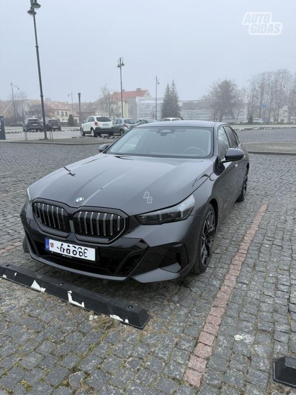 Grey BMW 520 2024 in Klaipeda, with an engine capacity of 2.00 L and mileage of 69 thousand km for 47700 €, photo 3 on AUTOMOTO.COM.LV