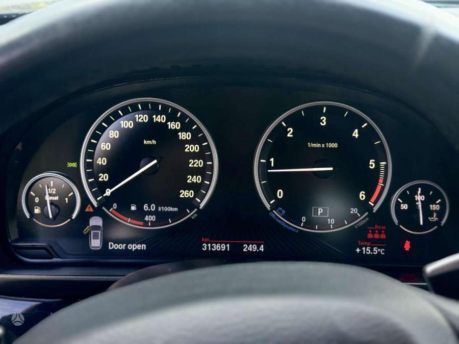 Grey BMW 520 2012 in Kaunas, with an engine capacity of 2.00 L and mileage of 314 thousand km for 8400 €, photo 13 on AUTOMOTO.COM.LV