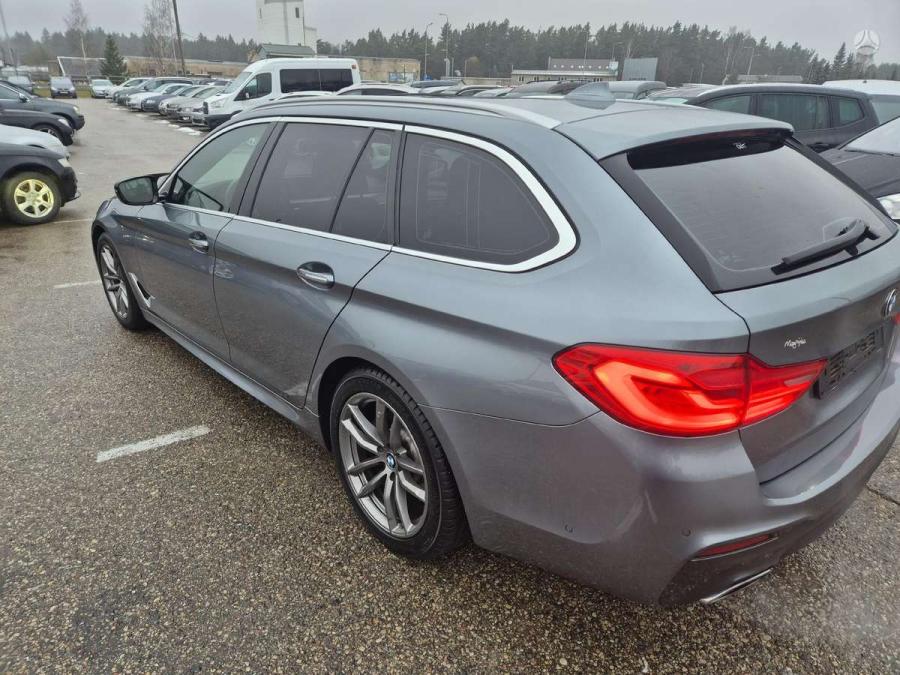 Grey BMW 520 2017 in Utena, with an engine capacity of 2.00 L and mileage of 263 thousand km for 17850 €, photo 15 on AUTOMOTO.COM.LV