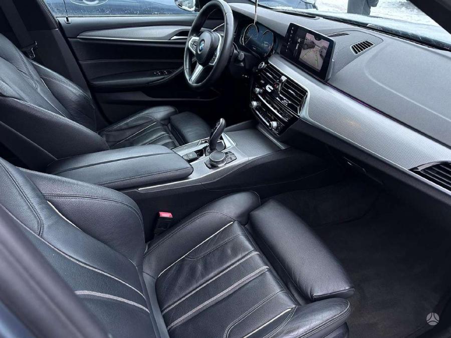 Grey BMW 520 2017 in Utena, with an engine capacity of 2.00 L and mileage of 263 thousand km for 17950 €, photo 17 on AUTOMOTO.COM.LV