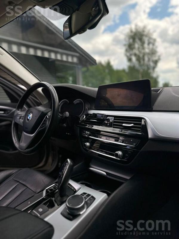 Grey BMW 520 2018 in Riga, with an engine capacity of 2.00 L and mileage of 220 thousand km for 15800 €, photo 7 on AUTOMOTO.COM.LV