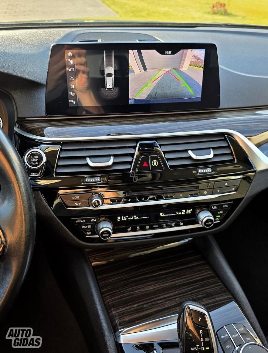 Grey BMW 520 2019 in Druskininkai, with an engine capacity of 2.00 L and mileage of 128 thousand km for 18150 €, photo 10 on AUTOMOTO.COM.LV