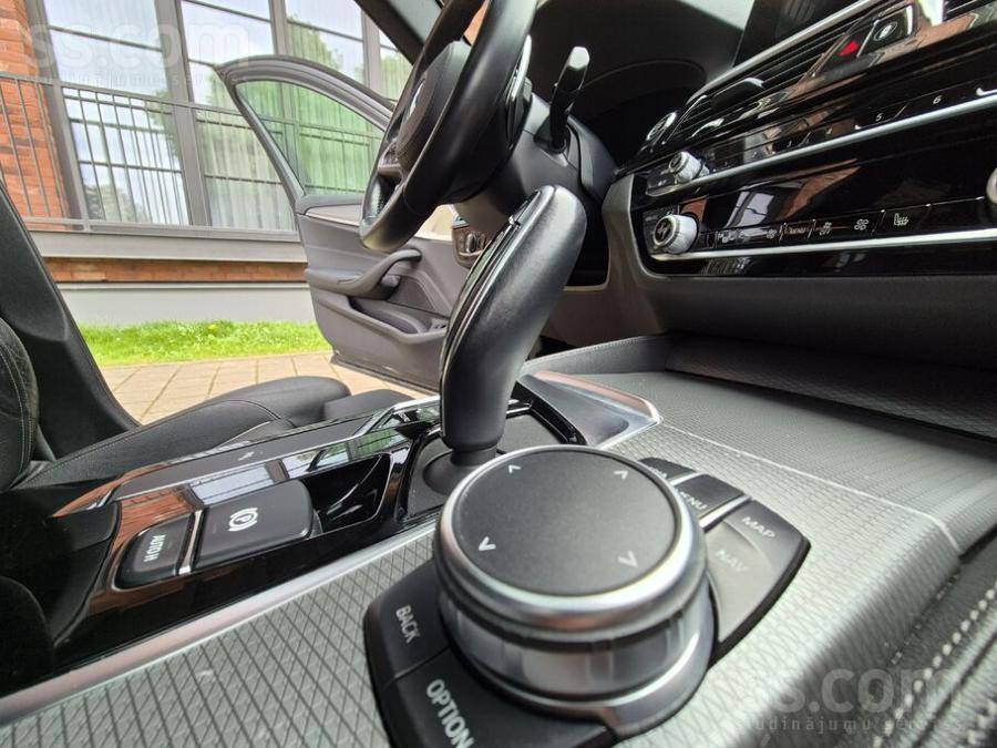 Grey BMW 520 2019 in Riga, with an engine capacity of 2.00 L and mileage of 183 thousand km for 24499 €, photo 12 on AUTOMOTO.COM.LV
