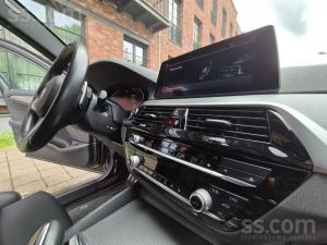 Grey BMW 520 2019 in Riga, with an engine capacity of 2.00 L and mileage of 183 thousand km for 24499 €, photo 13 on AUTOMOTO.COM.LV