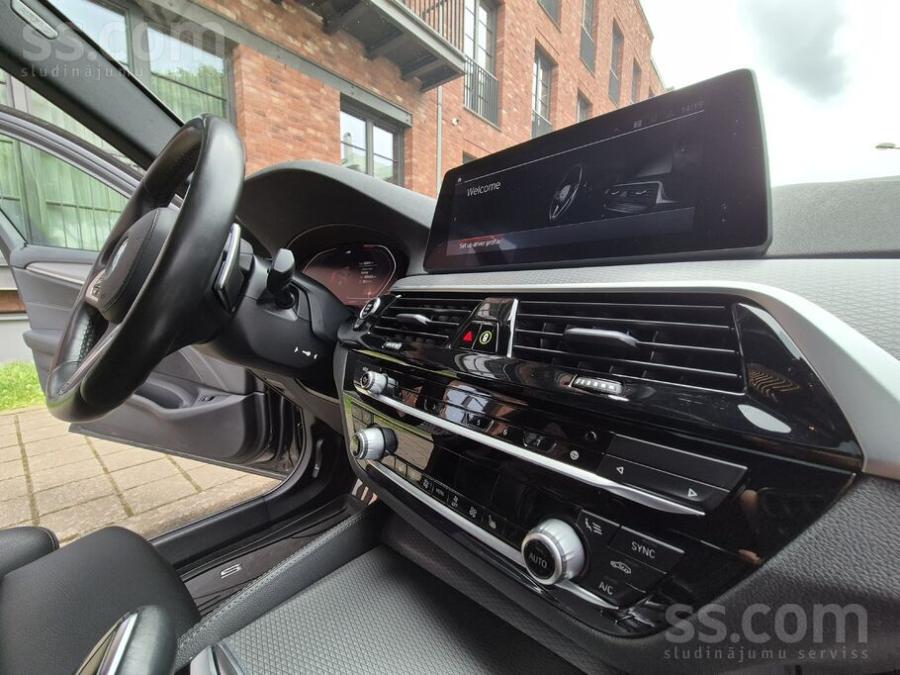 Grey BMW 520 2019 in Riga, with an engine capacity of 2.00 L and mileage of 183 thousand km for 24499 €, photo 13 on AUTOMOTO.COM.LV