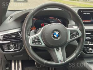 Grey BMW 520 2019 in Riga, with an engine capacity of 2.00 L and mileage of 183 thousand km for 24499 €, photo 14 on AUTOMOTO.COM.LV